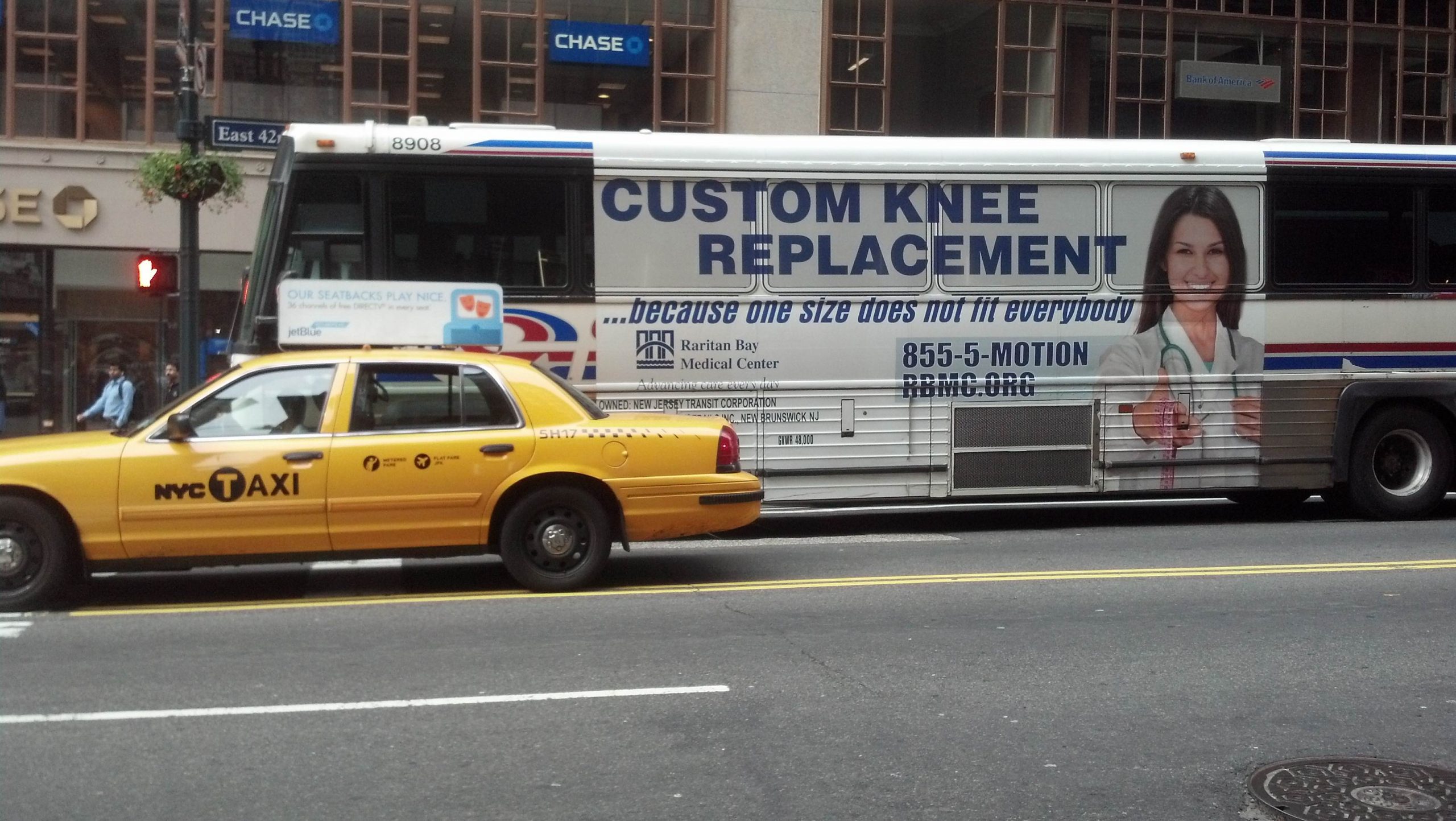 custom knee replacement ad on bus - ClearHealthCosts