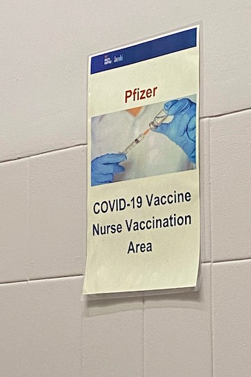 nurse vaccination area sign - ClearHealthCosts